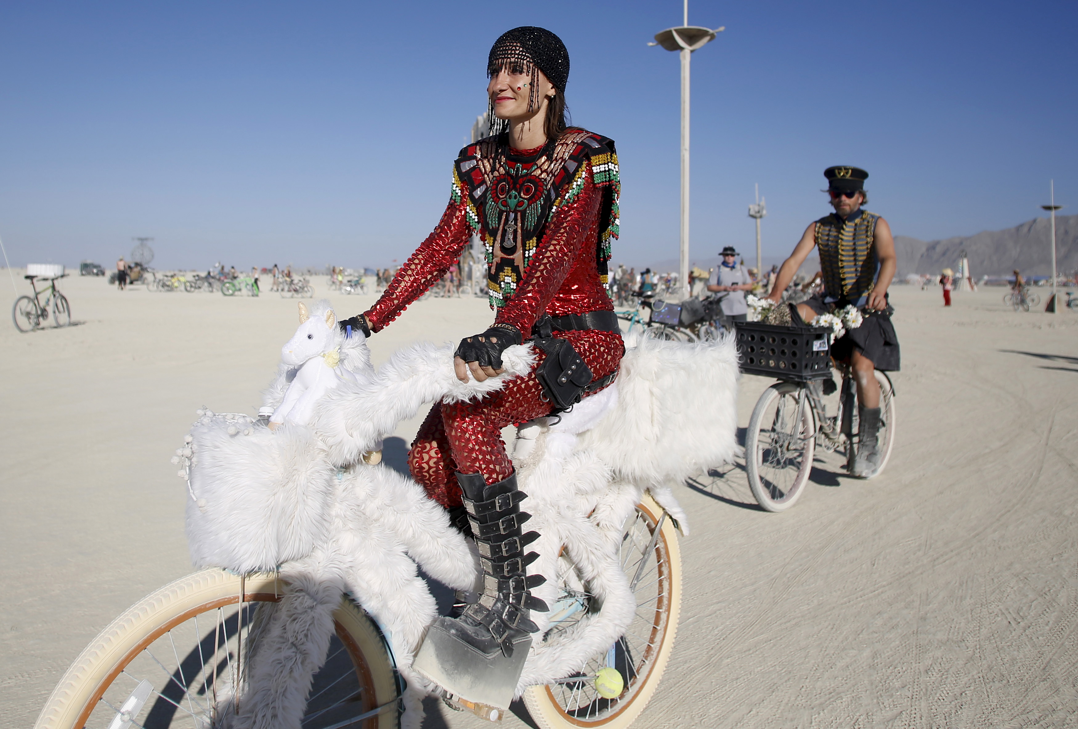 Photos: Biking do’s and don’ts at the Burning Man festival | PBS NewsHour