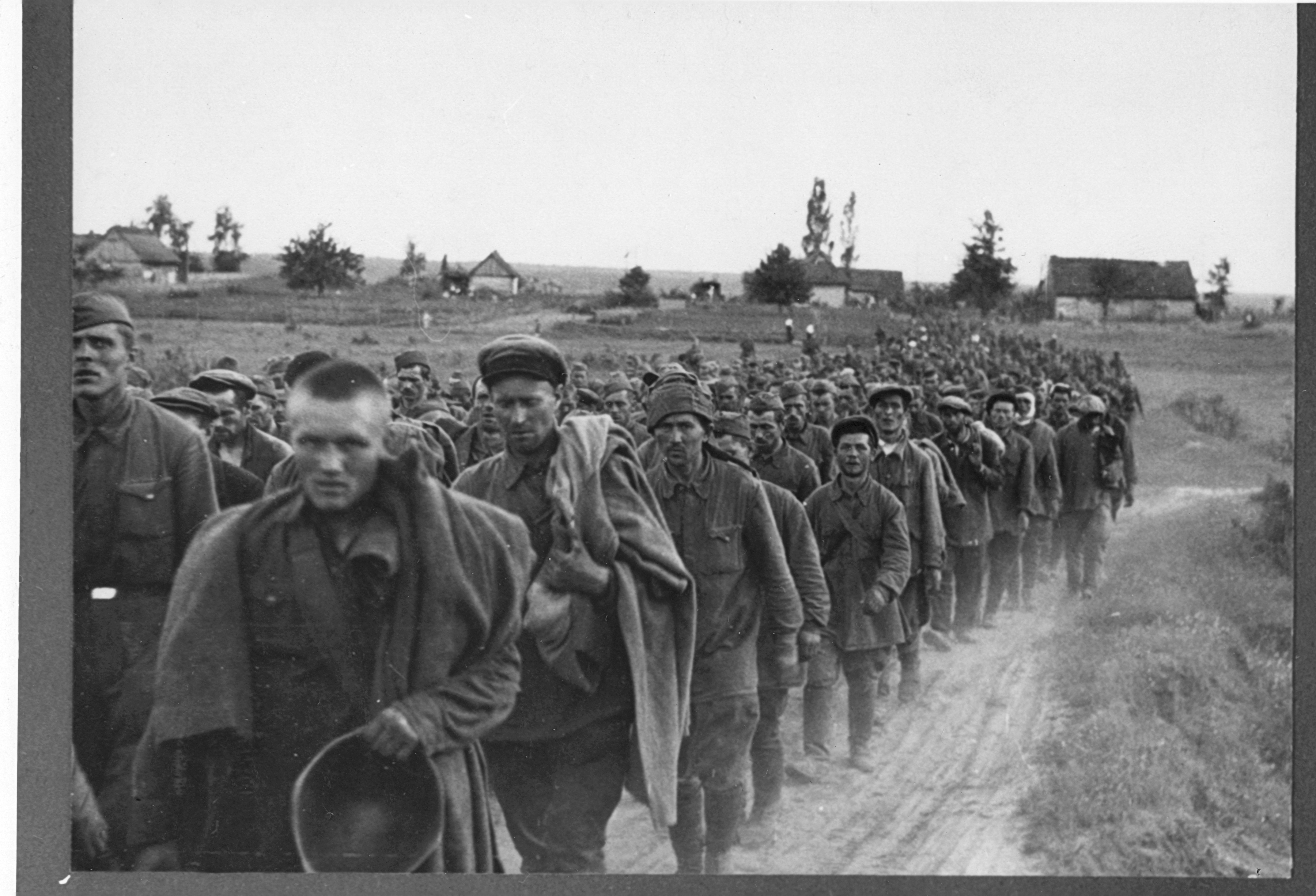 Russian prisoners of war march down road. | Secrets of the Dead | PBS